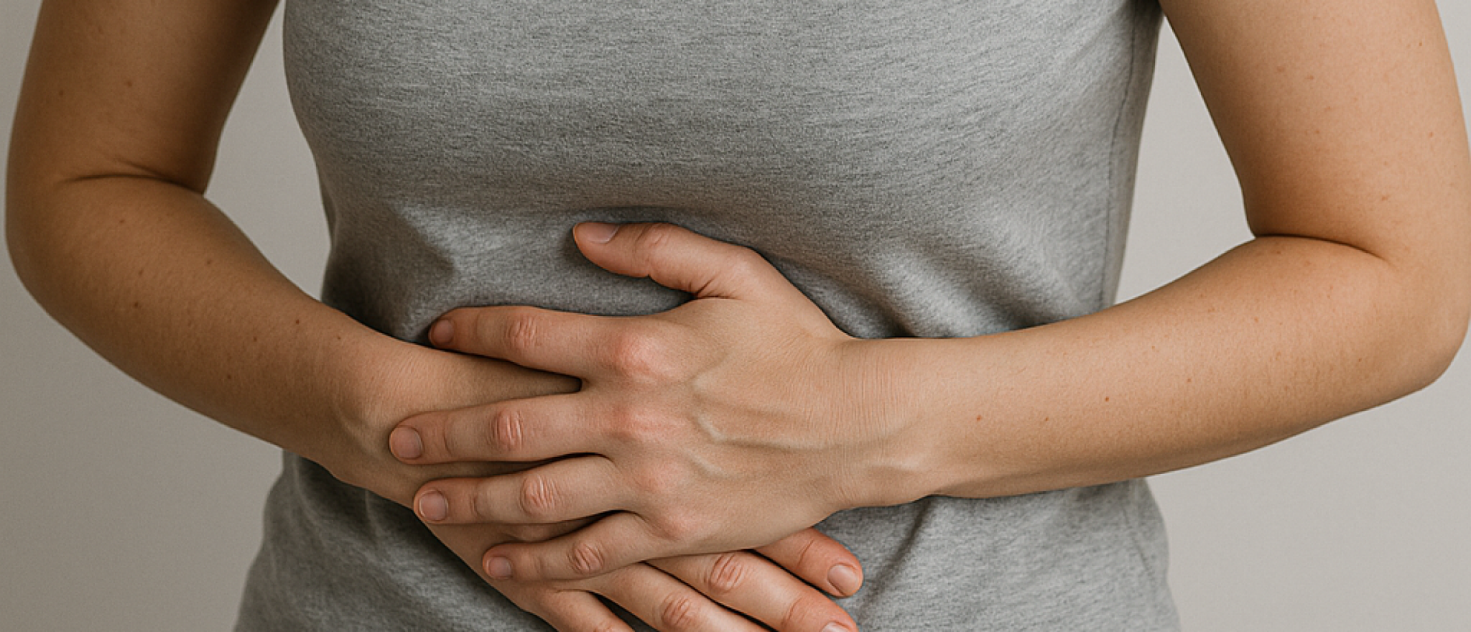 Pijn onder de ribben bij je buik?