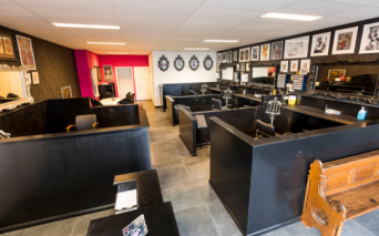 Over Cash and Glory tattoo & piercing